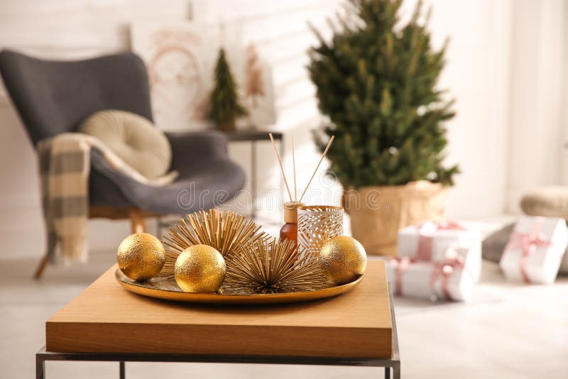Elegant Christmas Decor and Reed Diffuser on Table Indoors. Interior ...