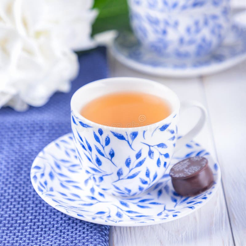 Cup of Green Tea, Candy and White Hydrangea Stock Photo - Image of chic ...