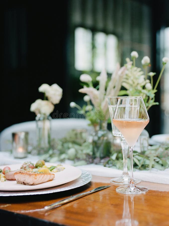 Elegant Dining Experience Featuring Gourmet Meal and Refreshing Drink ...