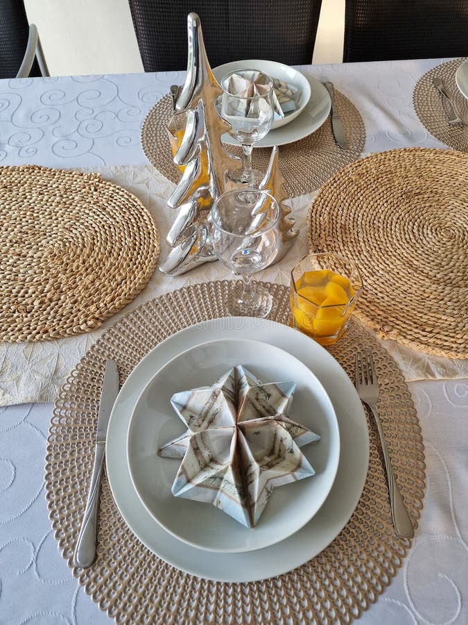 An Elegant Dining Setup Featuring Creative Napkin Folding Ideas for ...