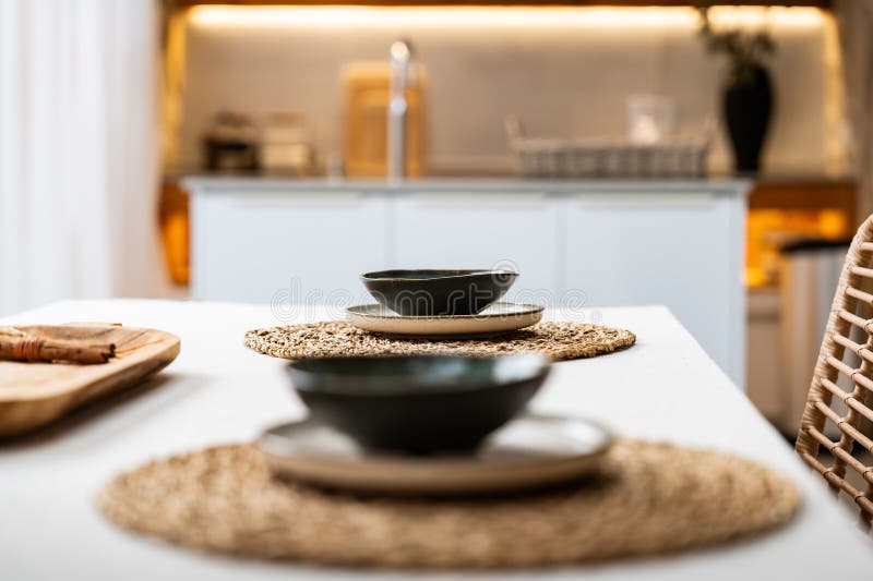 Elegant Dining Setup with Stylish Dishware in a Modern Kitchen Stock ...