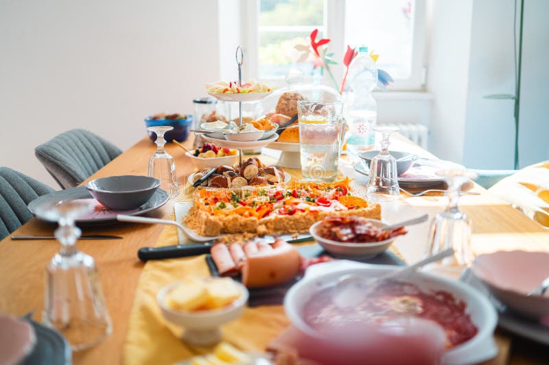 Elegant Dining Table Setup with Delicious Brunch Spread Including ...