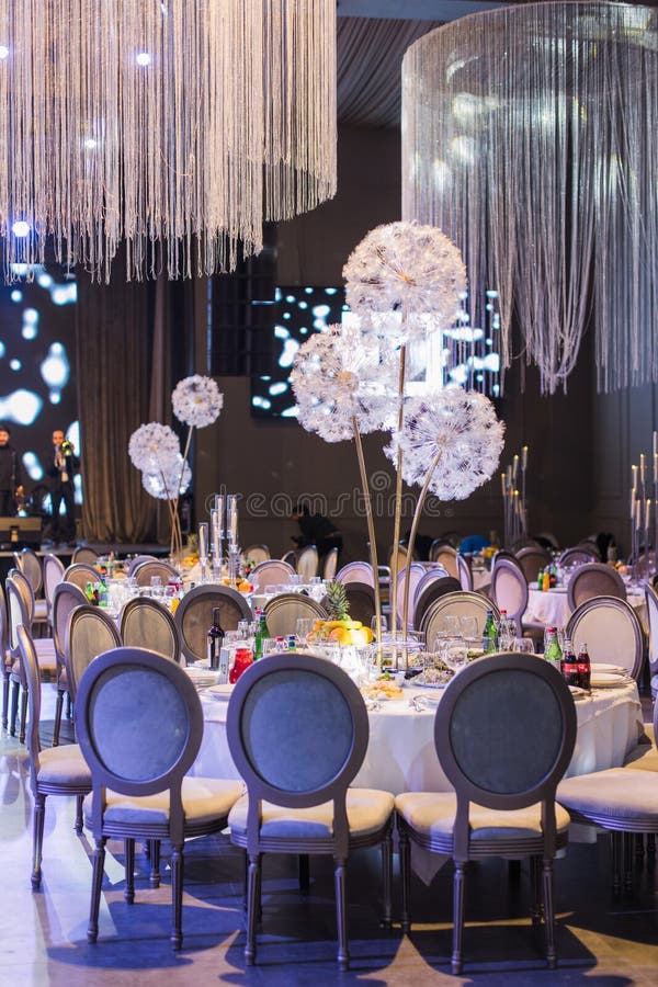 Elegant Dinner Event Set Up in Front of Large Windows Stock Photo ...