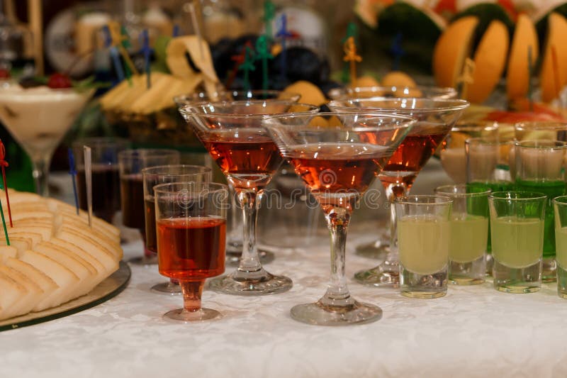 Elegant Display of Colorful Cocktails and Appetizers on a Festive Table ...