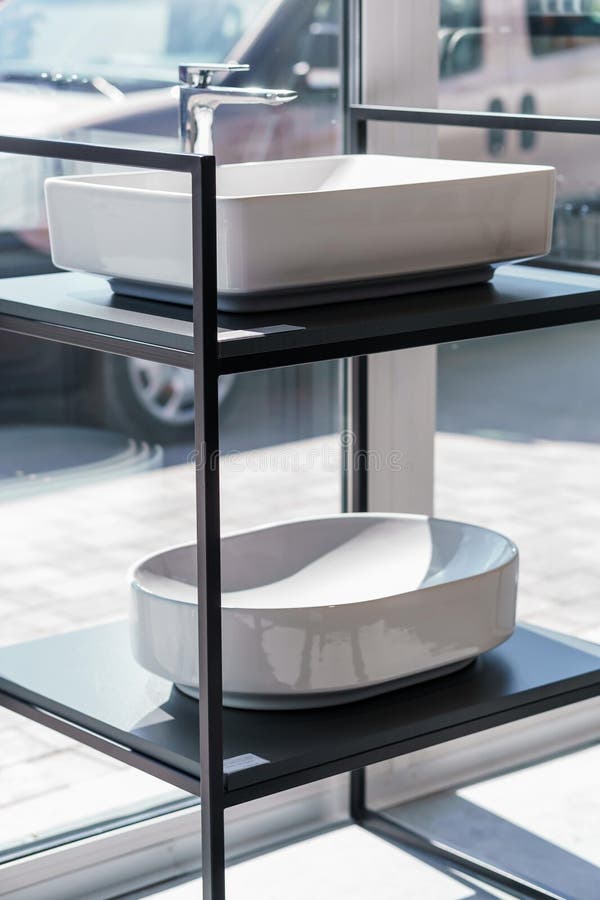 Elegant Display of Modern Ceramic Basins in Sunlit Bathroom Setting ...