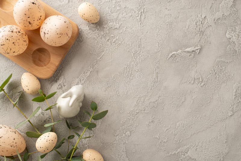 Elegant Easter Top View Setup with Pastel-colored Eggs in a Rustic ...