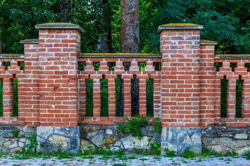 An Elegant Fence Made of Brick Columns. Background with Copy Space for ...