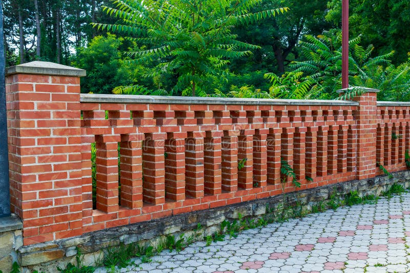 An Elegant Fence Made of Brick Columns. Background with Copy Space for ...