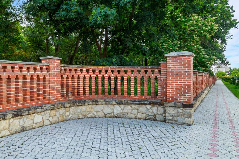 An Elegant Fence Made of Brick Columns. Background with Copy Space for ...