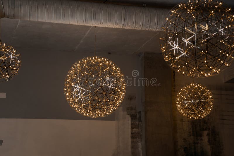 Elegant Geometric Pendant Lights in Modern Industrial Space Stock Photo ...