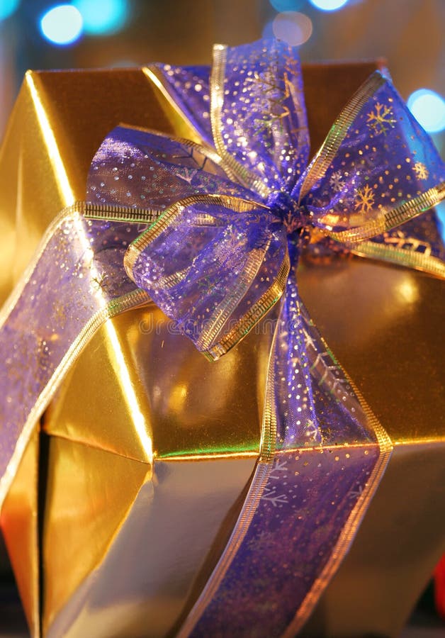 Gold Present with Blue Ribbons Stock Photo - Image of paper, birthday ...