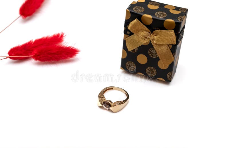 Elegant Gold Ring with Gemstone and Gift Box Stock Image - Image of ...