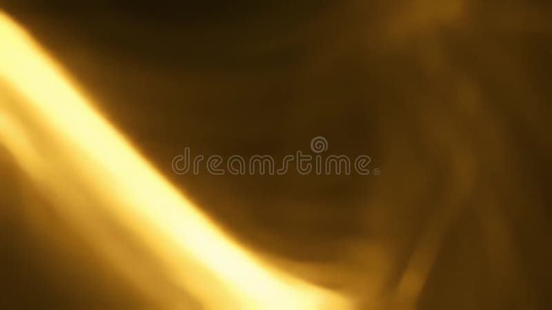 Elegant Golden Light Curves Moving Gracefully in a Dark Background ...