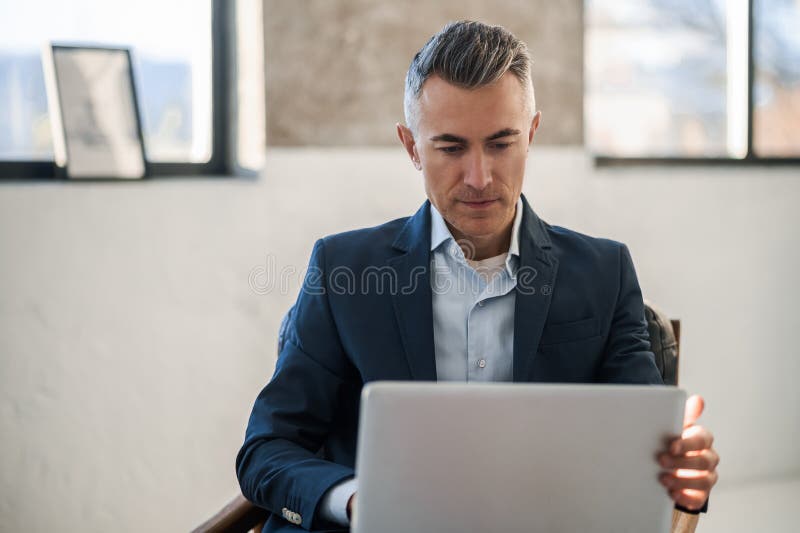 Elegant Good-looking Man in a Suit Working in the Office Stock Image ...