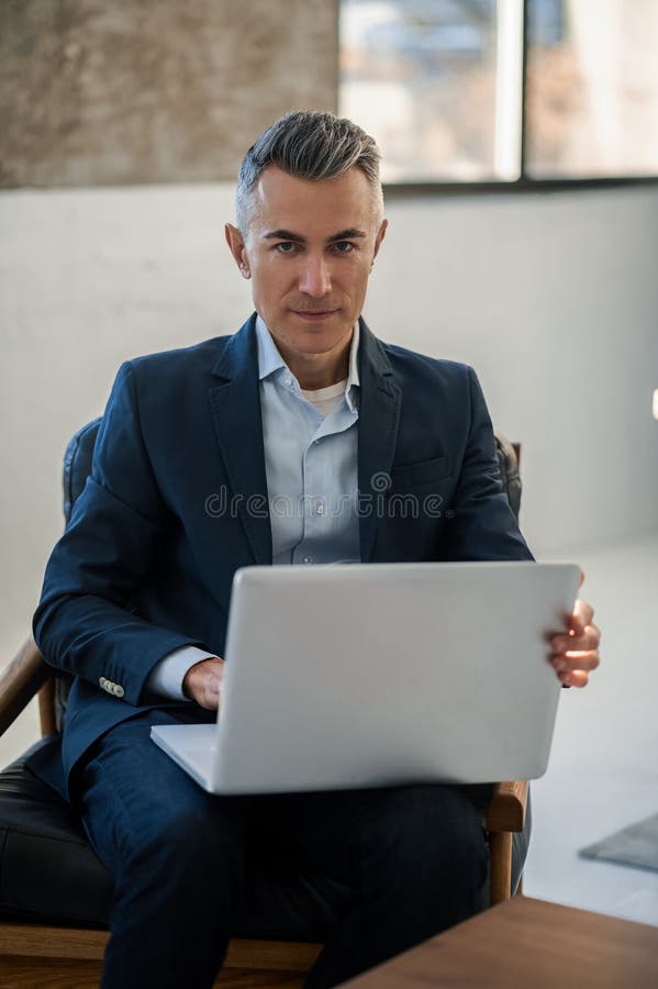 Elegant Good-looking Man in a Suit Working in the Office Stock Image ...