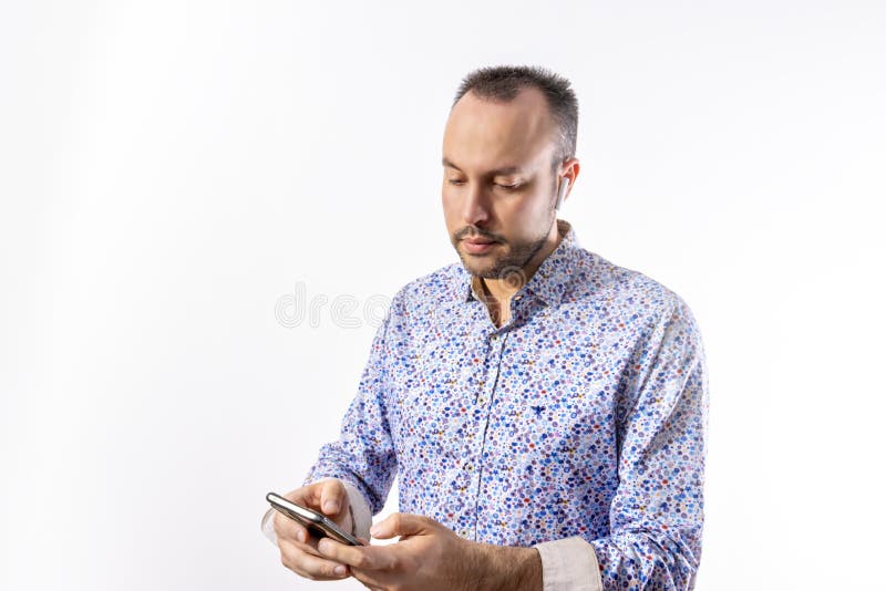 Elegant Guy with Headphones Making a Video Call at White Background ...