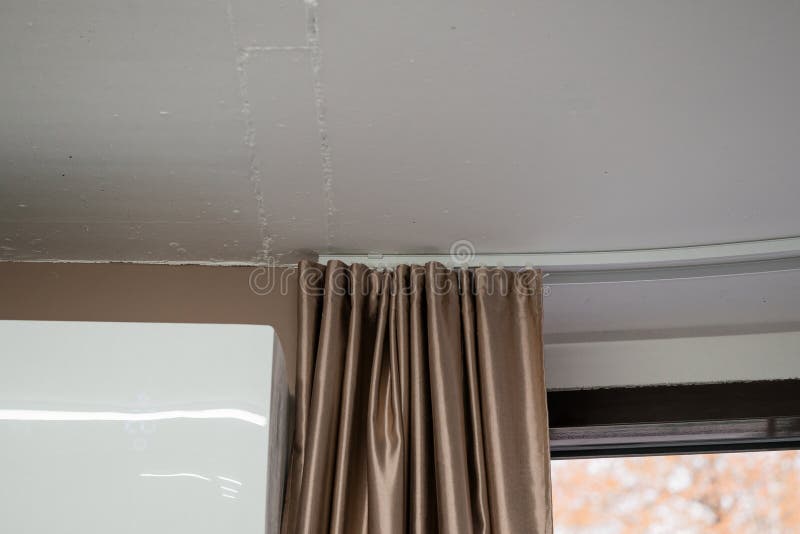 Elegant Interior with Light Brown Drapes and Modern Design Elements ...