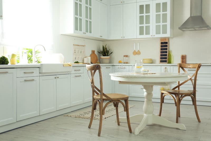 Elegant Kitchen Interior with White Round Table Stock Photo - Image of ...