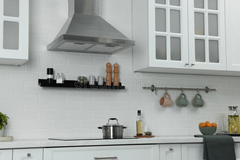 Elegant Kitchen Interior with Range Hood and Furniture Stock Photo ...