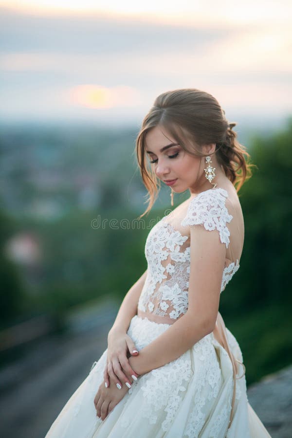 Elegant Lady in White Dress. Young Model in Evening Dress Stock Photo ...