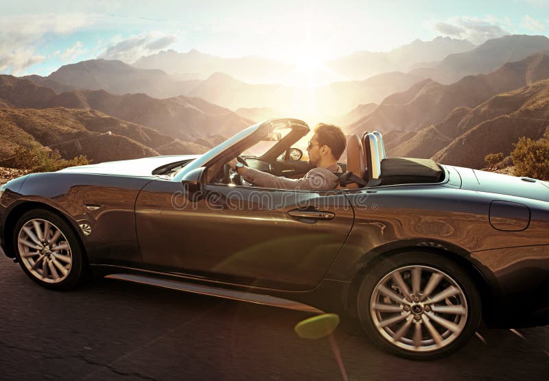 Elegant Man Driving a Convertible Stock Image - Image of rocks, rich ...