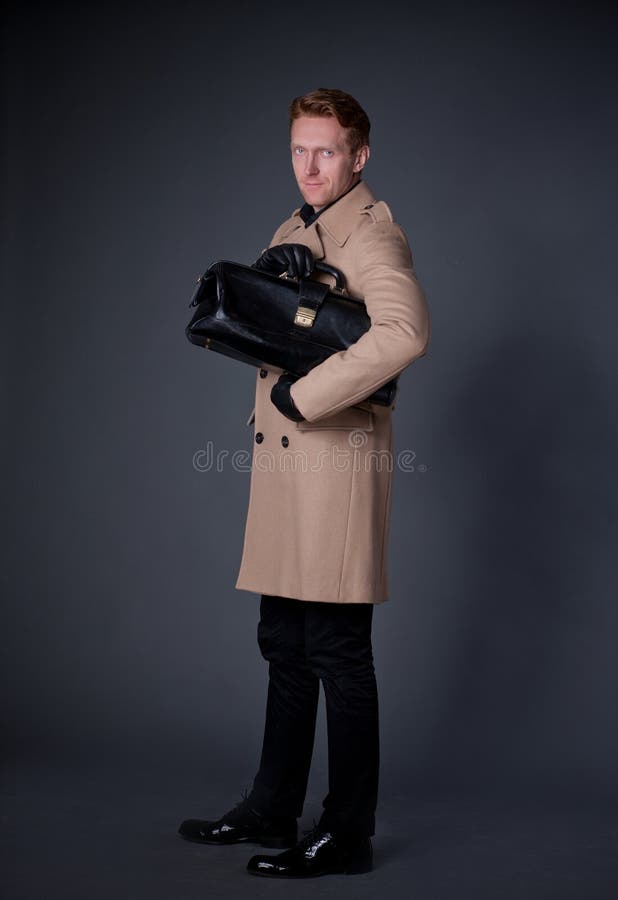 Elegant Man with a Hand Bag Stock Image - Image of adult, style: 47997409