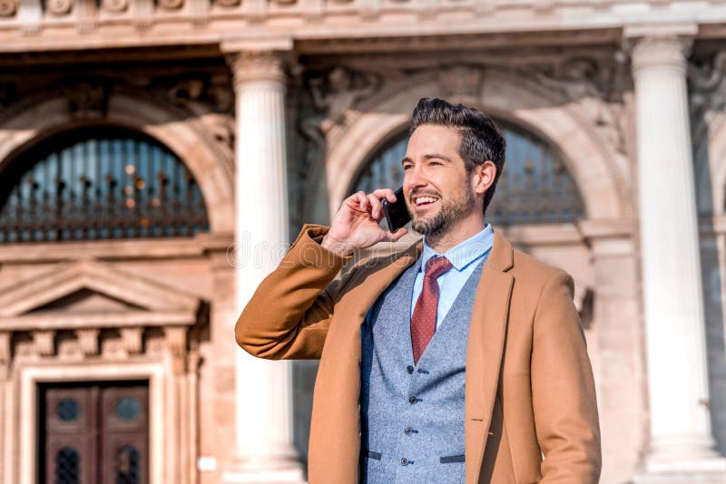 An Elegant Man on a Square Using His Smartphone Stock Photo - Image of ...