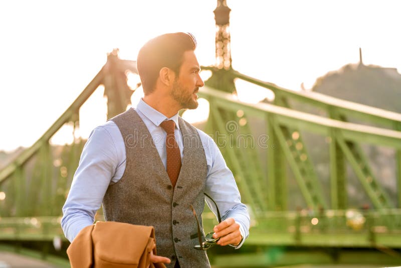 An Elegant Man Standing Next To a River Stock Image - Image of handsome ...