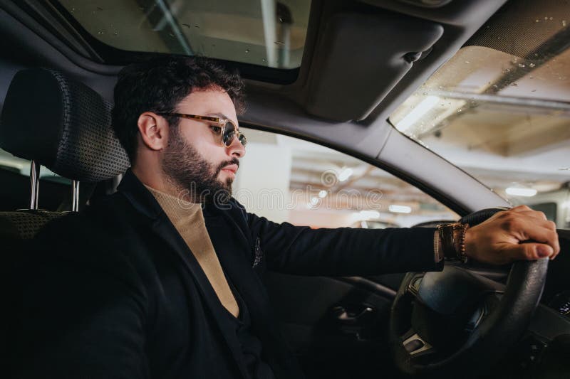 Confident Businessman Driving a Luxury Car through the City Stock Image ... Confident Businessman Driving a Luxury Car through the City Stock Image ...