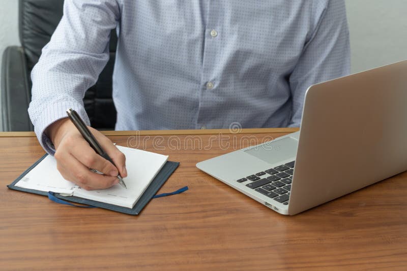 Elegant man taking notes editorial photography. Image of break - 190923667