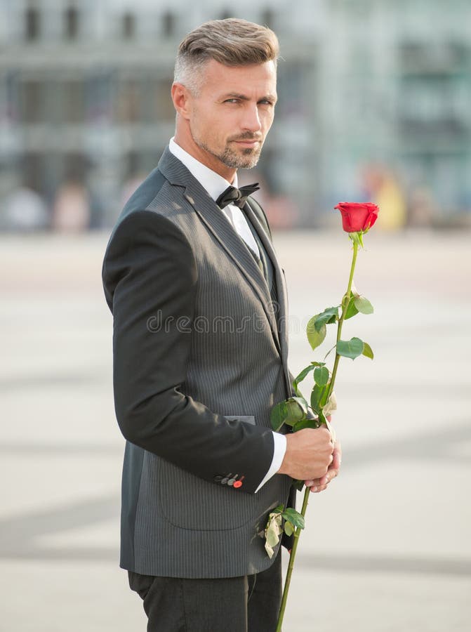 Elegant Man in Tux at Romantic Occasion. Man with Romantic Present ...