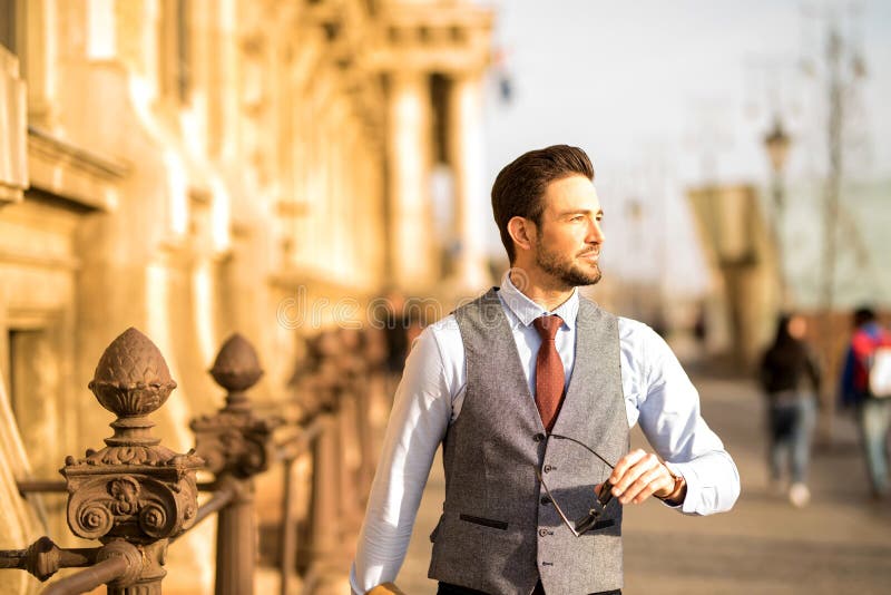 An Elegant Man Walking on the Streets Stock Image - Image of suit ...