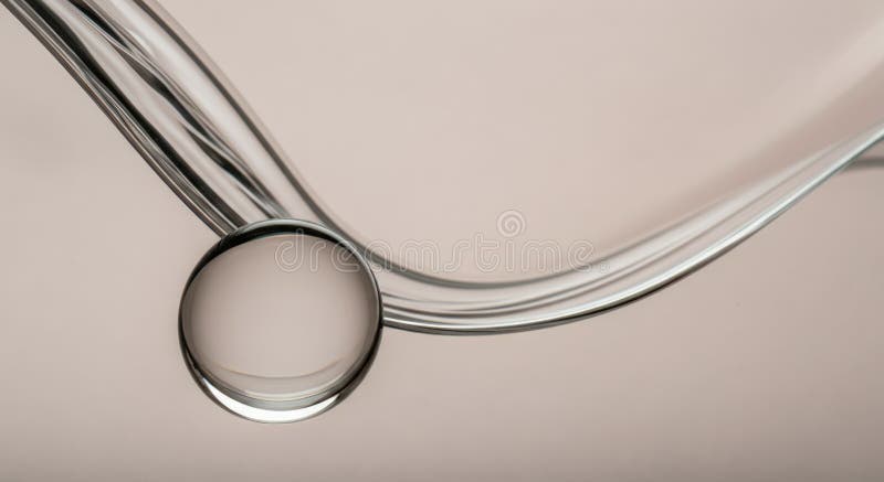 Elegant Minimalist Design with Glass Sphere and Curved Lines in Soft ...