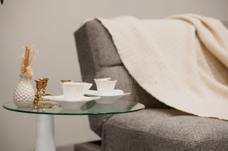 Elegant Minimalist Tea Setting on a Cozy Sofa Stock Image - Image of ...