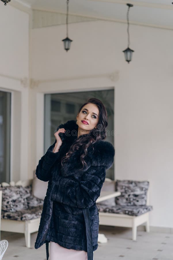 Elegant Model in Black Coat Stock Photo - Image of glamour, beauty ...