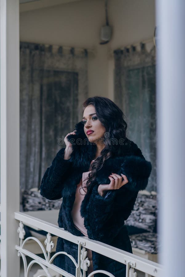 Elegant Model in Black Coat Stock Image - Image of clothes, adult: 68916313