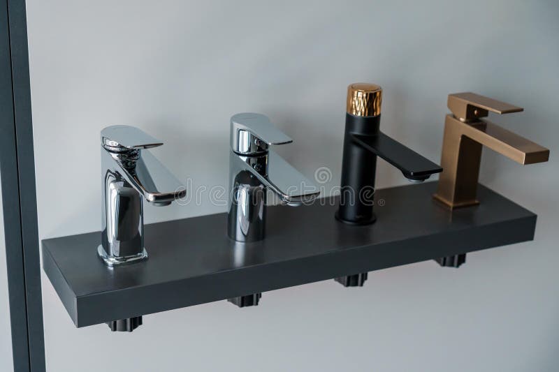 Elegant Modern Faucet Collection Display on Sleek Black Shelf Stock ...