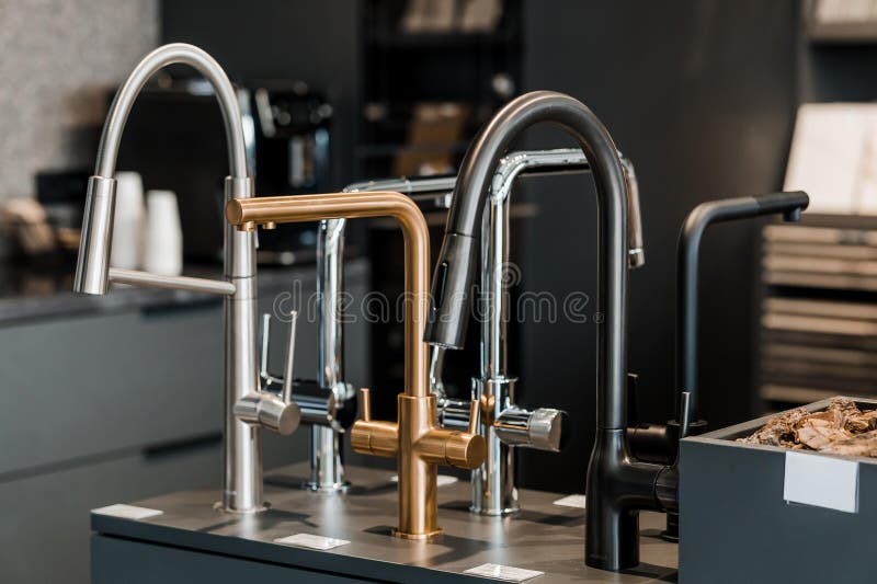 Elegant Modern Kitchen Faucets Display in Showroom Setting Stock Photo ...