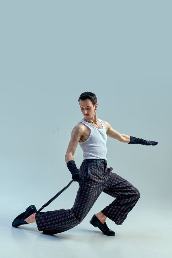 Elegant Movement Captured in Sharp Lines, Dancer Balancing Strength and ...