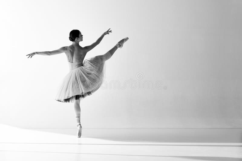 Elegant Movements Of One Beautiful Ballerina Dancing Isolated Over