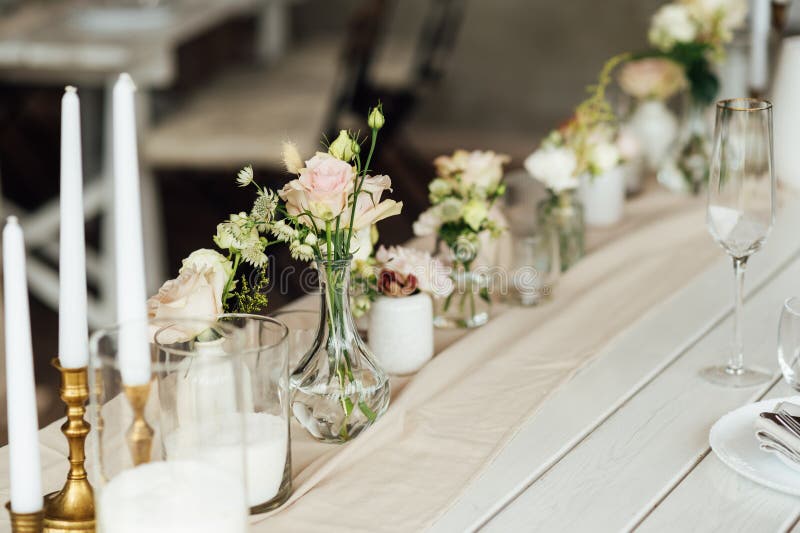 Elegant Neutral Coloured Wedding Table Scape with Flowers and Candles ...