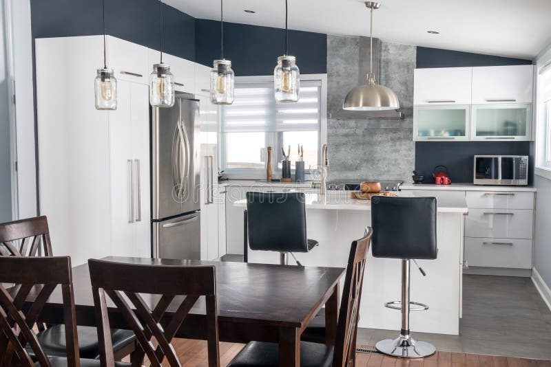 Elegant New Modern Home Dining Room and Kitchen Stock Image - Image of ...