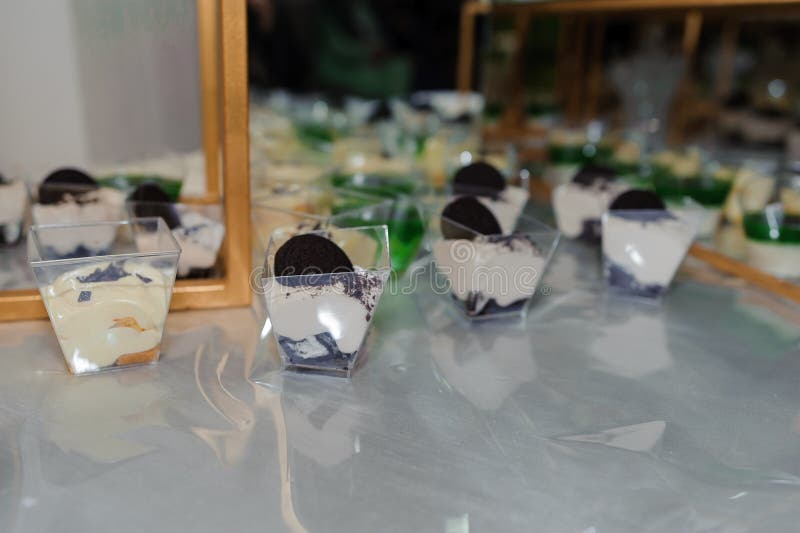 Elegant Oreo Dessert Cups Displayed on Silver Table for a Celebration ...