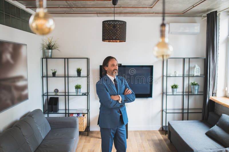 Elegant Real Estate Agent Presenting Apartment for Rent Stock Image ...