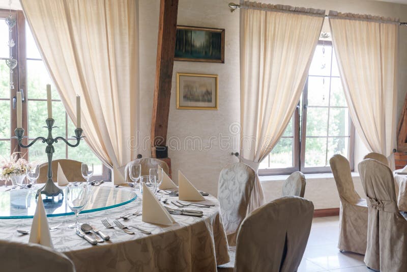 Elegant round tables stock photo. Image of laid, cutlery - 63518928