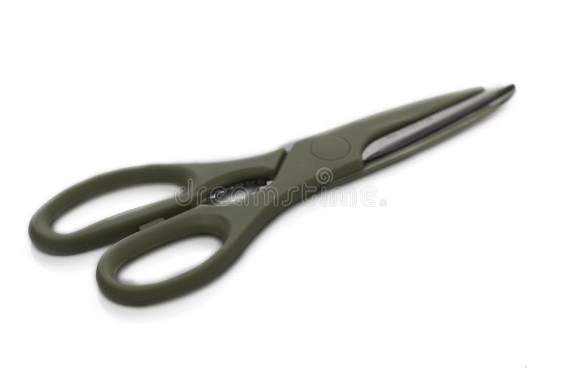 Elegant Scissors with a Sleek Design Resting on a White Surface in Soft ...