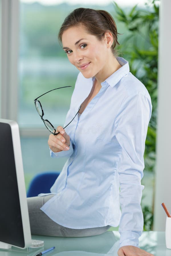 Elegant Secretary Sat on Office Desk Stock Photo - Image of secretary ...