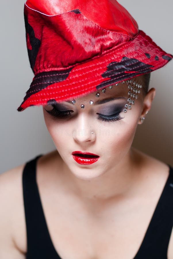 Elegant Young Woman with Red Hat & Crystals Stock Photo - Image of ...
