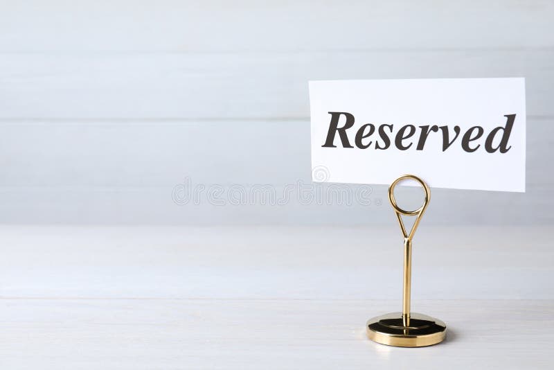 Elegant Sign RESERVED on White Wooden Surface, Space for Text. Table ...