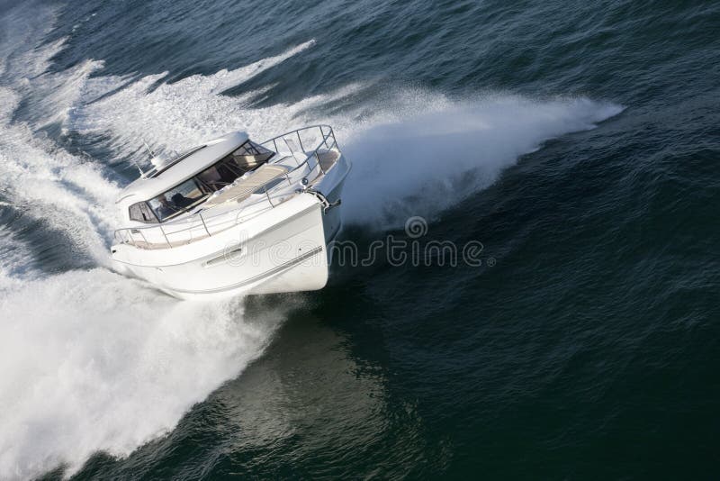 Elegant Speed Boat Sailing through a Deep Ocean Stock Image - Image of ...